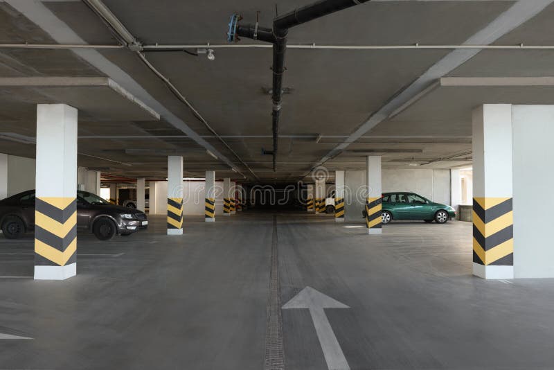 Open Parking Garage with Cars and Empty Slots Stock Photo - Image of ...