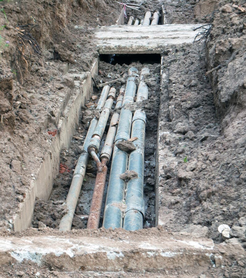 An Open Pit with Communications for the Repair of Dilapidated Pipes ...