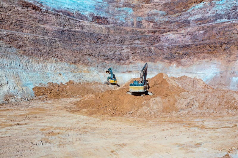 Open Pit Mine in Full Operation, with Machinery Extracting Minerals ...