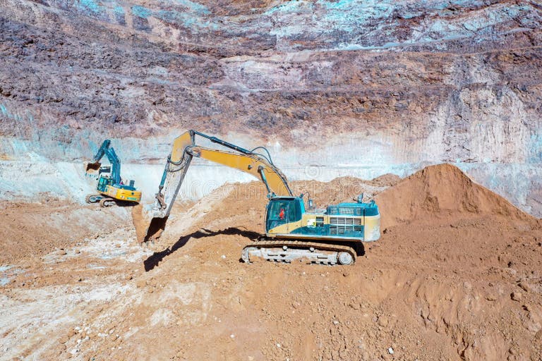 Open Pit Mine in Full Operation, with Machinery Extracting Minerals ...