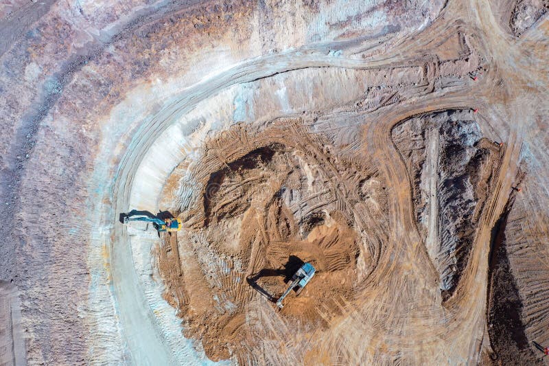 Open Pit Mine in Full Operation, with Machinery Extracting Minerals ...