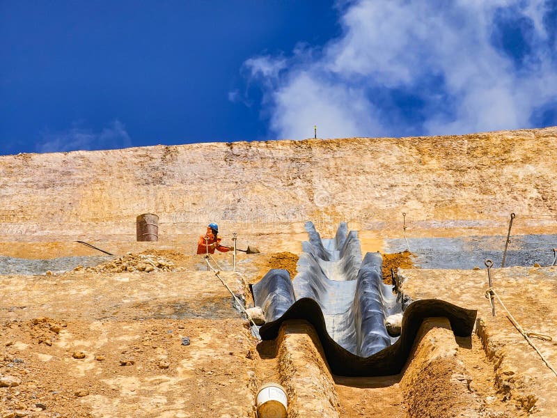 Open Pit Mine Worker Working on Construction of Water Canals Stock ...