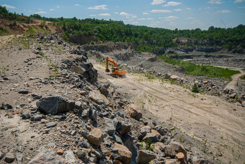 Open Pit Mining and Loading of Granite Stock Photo - Image of excavator ...