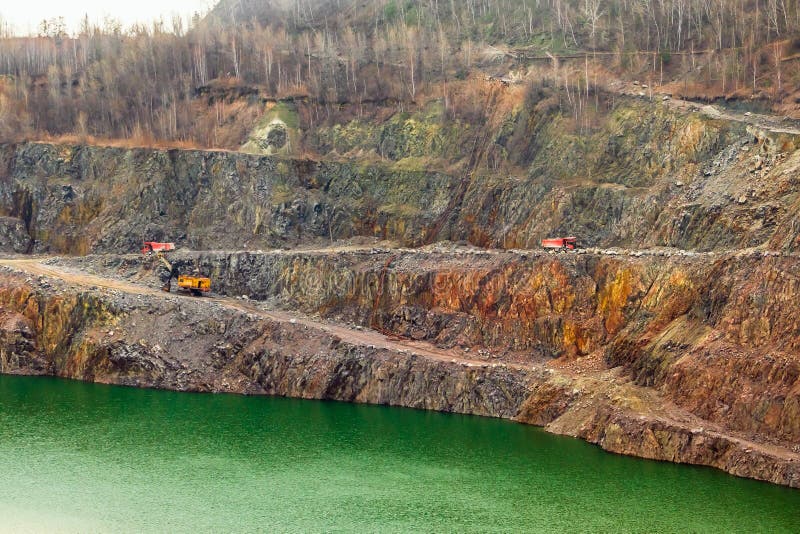 Open Pit Mining of Minerals in Ukraine. Granite Quarry with a Lake ...