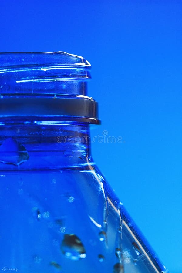 Empty Blue Plastic Bottle with Blue Background Stock Image - Image of ...