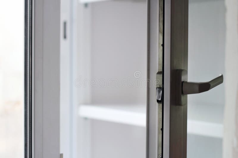 Close Up of Metal Object with Background Lights Stock Image - Image of ...