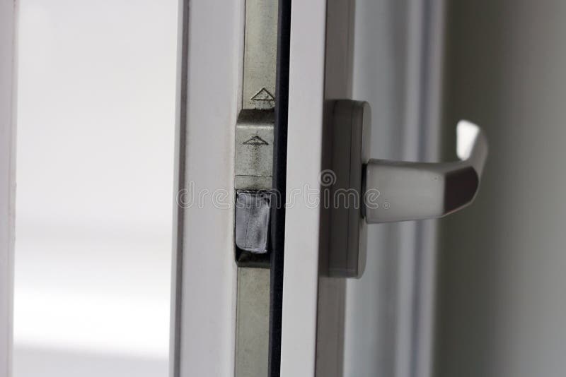 Close Up of Metal Object with Background Lights Stock Image - Image of ...