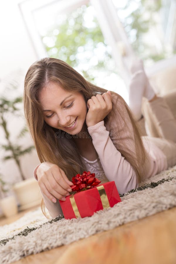Open the present stock image. Image of carpet, birthday - 80136365