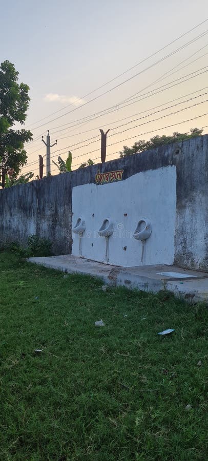 Open Public Urinals in a Park Field Stock Photo - Image of random, park ...