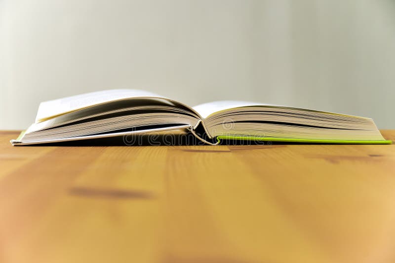 Open Book Lying Pile Books Stock Photos - Download 246 Royalty Free Photos