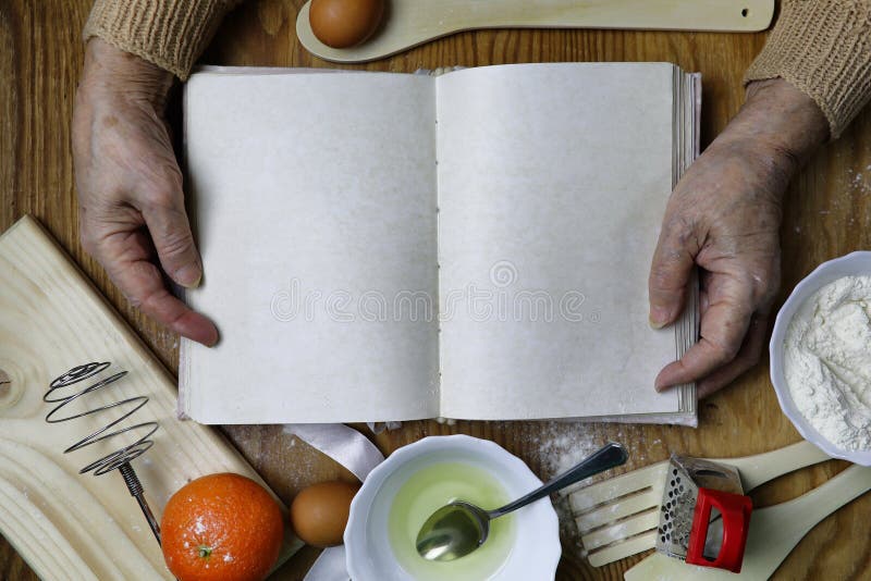 Open Recipe Book in the Hands of an Elderly Woman Stock Image - Image ...