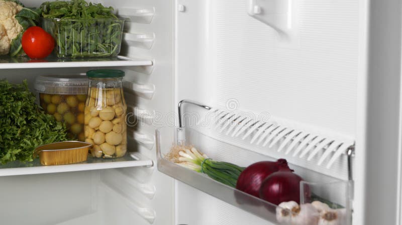 Open Refrigerator Full of Many Different Products Stock Photo - Image ...