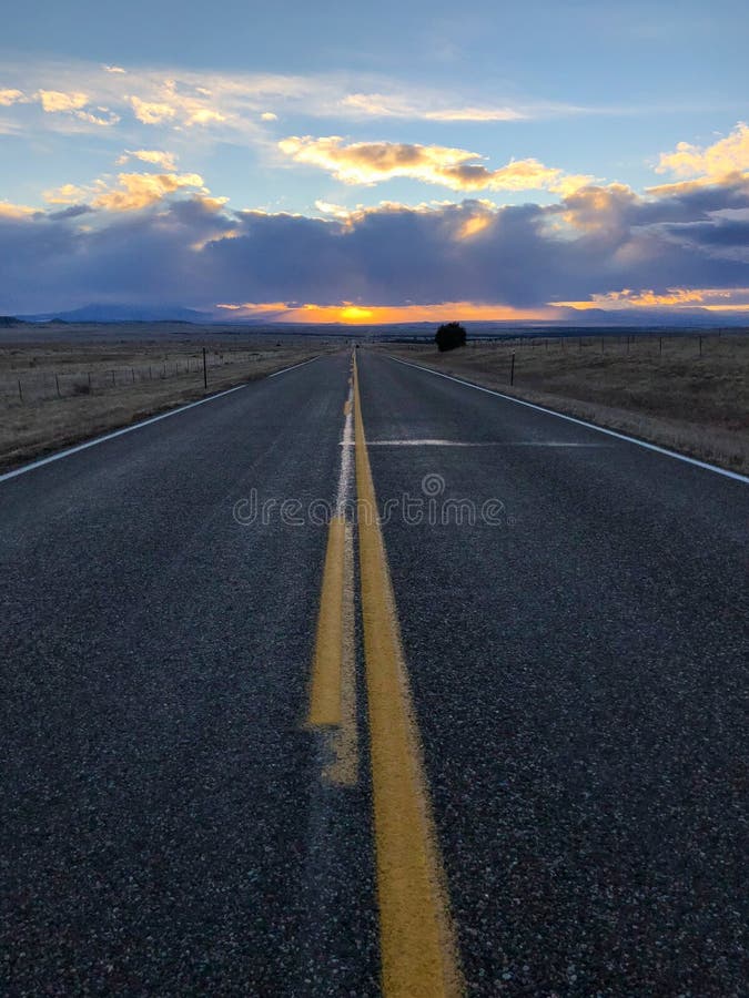 Open Road Going Off into the Sunset Stock Image - Image of road ...