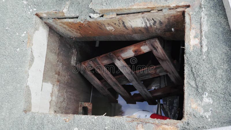Open Road Hatch with Water and Pallet Inside. Road Under Construction ...