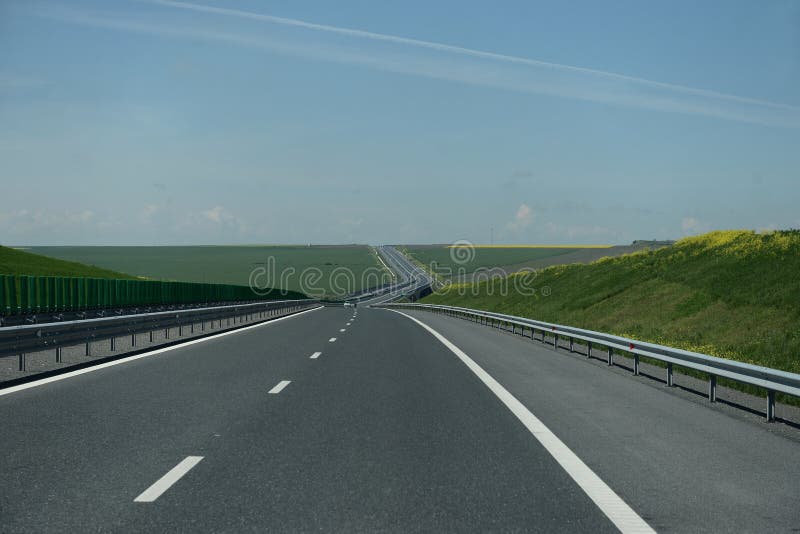 Open road in the hills stock image. Image of green, blue - 57584661