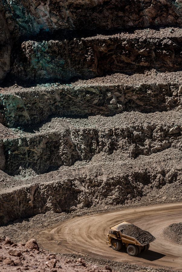 Open Rock Mine with Different Layers and a Truck Carrying Rocks Stock ...