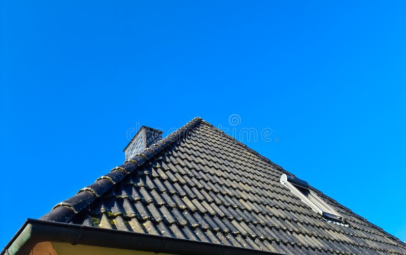 Open Roof Window in Velux Style with Black Roof Tiles Stock Photo ...