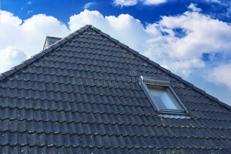 Open Roof Window in Velux Style with Black Roof Tiles Stock Image ...