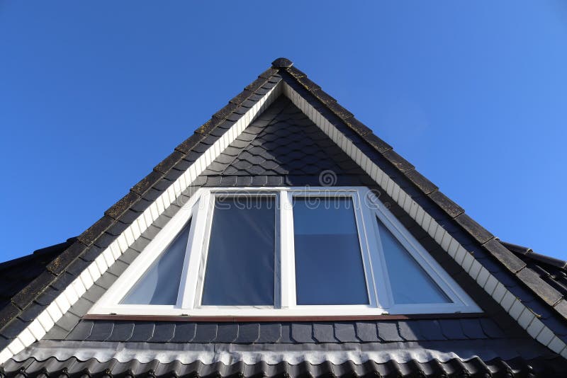 Open Roof Window in Velux Style with Black Roof Tiles Stock Image ...