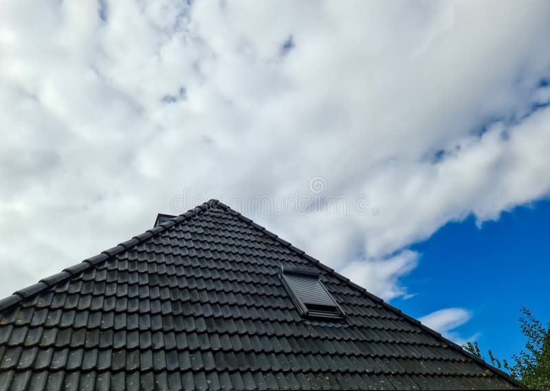 Open Roof Window in Velux Style with Black Roof Tiles Stock Image ...