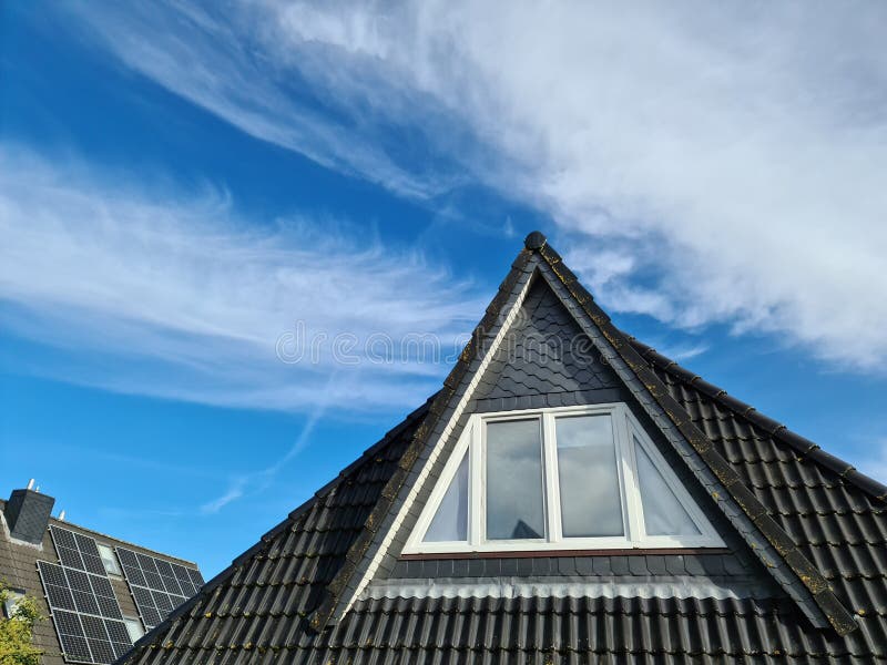 Open Roof Window in Velux Style with Black Roof Tiles Stock Photo ...
