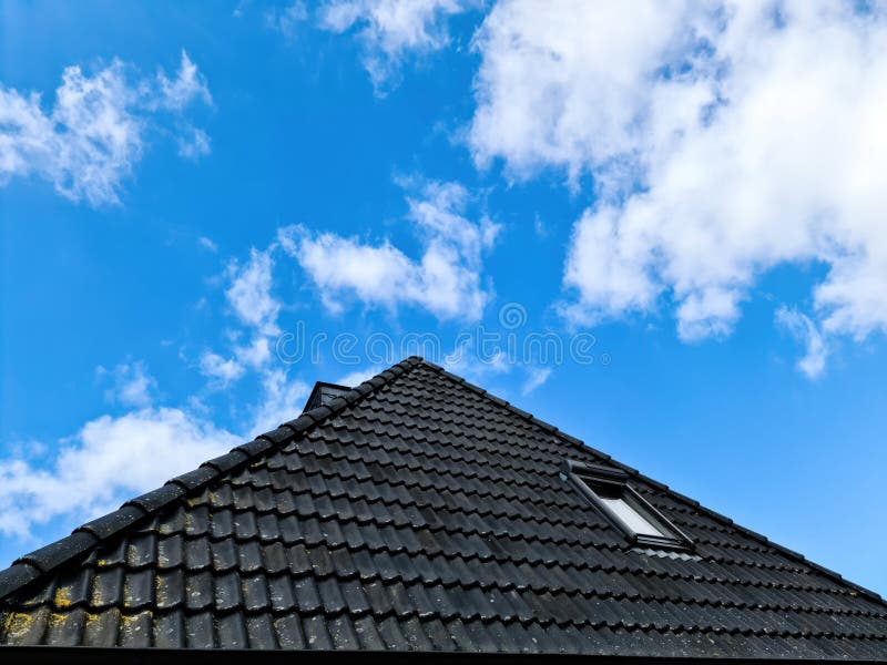 Open Roof Window in Velux Style with Black Roof Tiles Stock Photo ...
