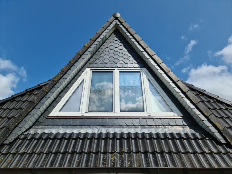 Open Roof Window in Velux Style with Black Roof Tiles Stock Image ...