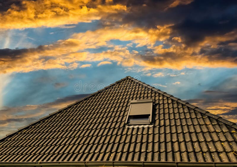 Open Roof Window in Velux Style with Black Roof Tiles Stock Image ...
