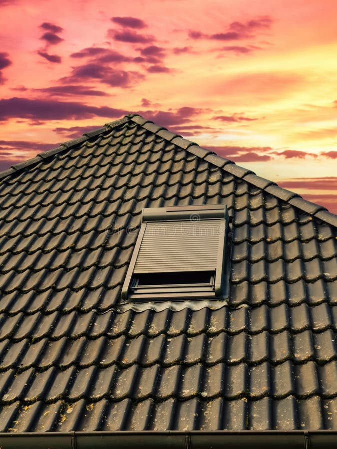 Open Roof Window in Velux Style with Black Roof Tiles Stock Image ...