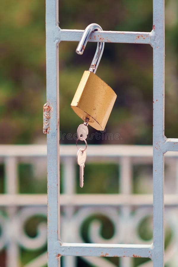 Open Rusty Lock with Keys Hanged on the Gate Stock Photo - Image of ...