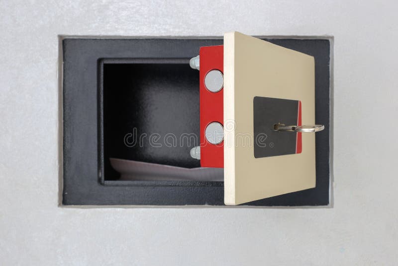 Open safe in the wall stock photo. Image of closeup - 164606636