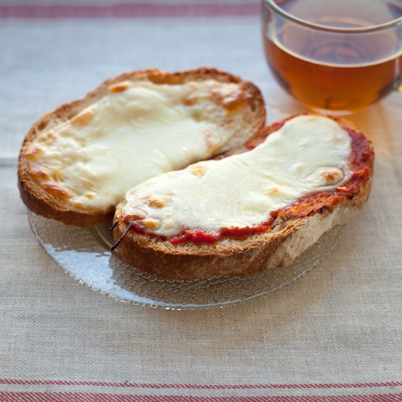 Open Sandwich with Cheese and Cup of Tea on Wooden Table. Breakfast ...
