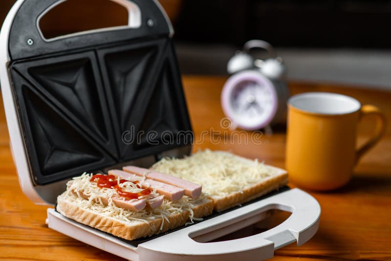 Open Sandwich Maker with Cheese Toast and Sausages. Sandwiching Stock ...