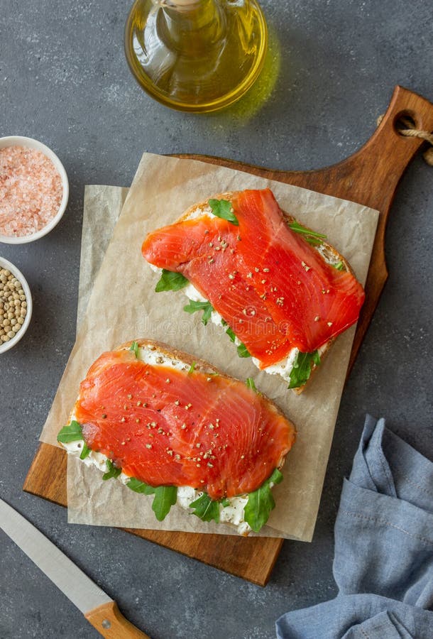 Open Sandwiches with Salmon, Arugula and White Cheese. Healthy Eating ...