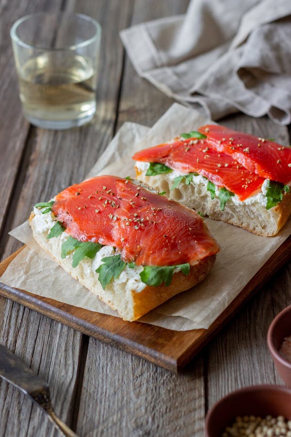 Open Sandwiches with Salmon, Arugula and White Cheese. Healthy Eating ...