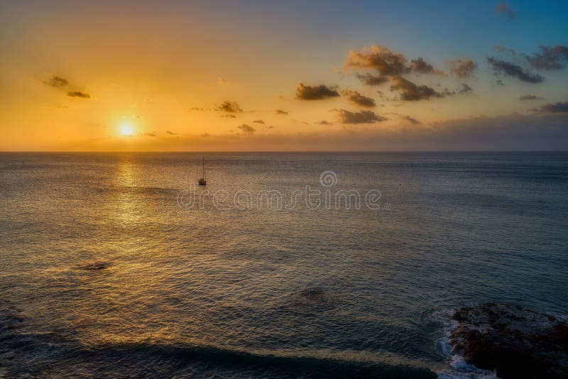 Single Ship Silhouetted Against a Beautiful Sunset Sky on the Open ...
