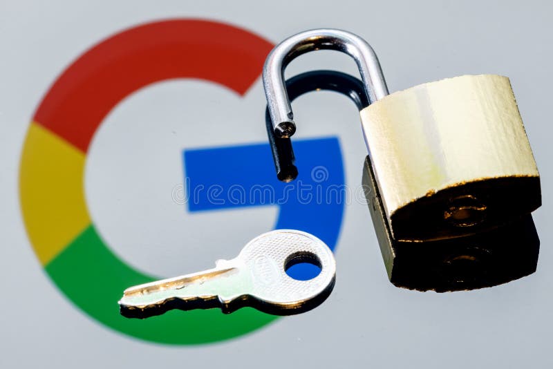 An Open Security Lock and Key on the Background of the Google ...