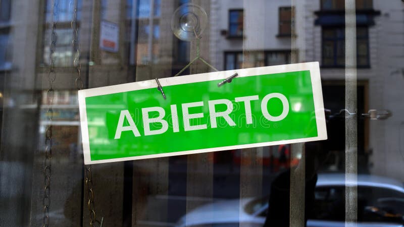 Open sign in Spanish stock photo. Image of europe, storefront - 371413890