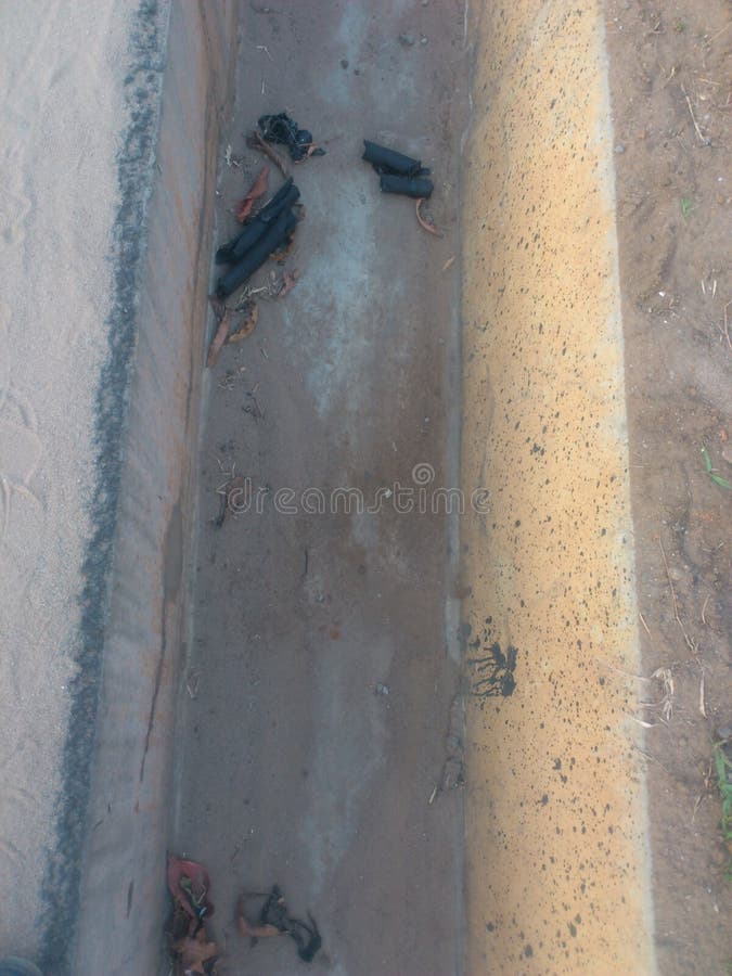 OPEN SKY GUTTER stock photo. Image of gully, passersby - 89776310