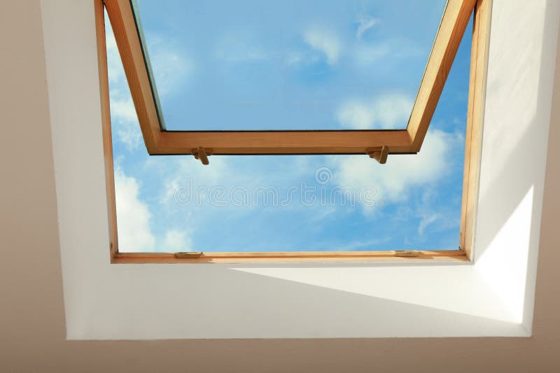 Open Skylight Roof Window on Slanted Ceiling in Attic Room, Low Angle ...