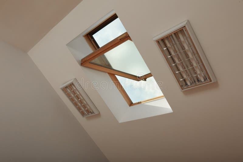 Open Skylight Roof Window on Slanted Ceiling in Attic Room, Low Angle ...