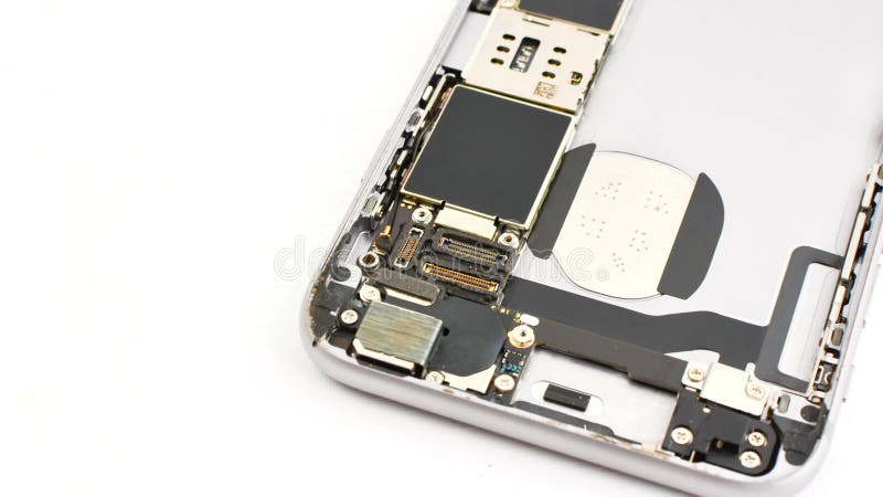 Open Smartphone Under Maintenance on a White Surface, Revealing Its ...