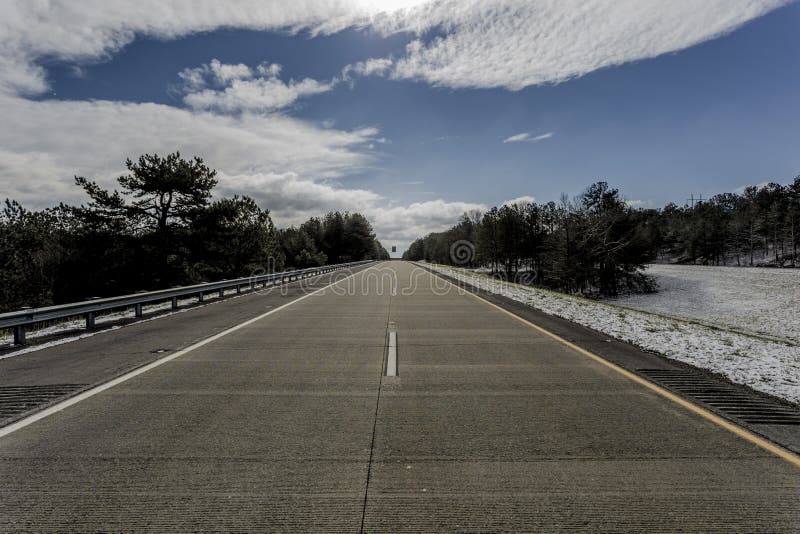 Open Snow Capped Road with Blue Sky Stock Photo - Image of landscape ...