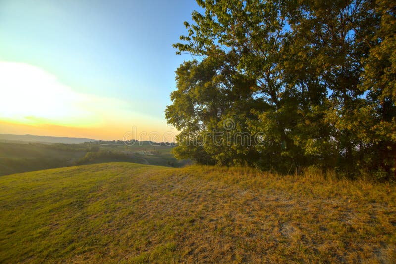 Open Space in a Field on a Hill Slope at Sunset Stock Image - Image of ...