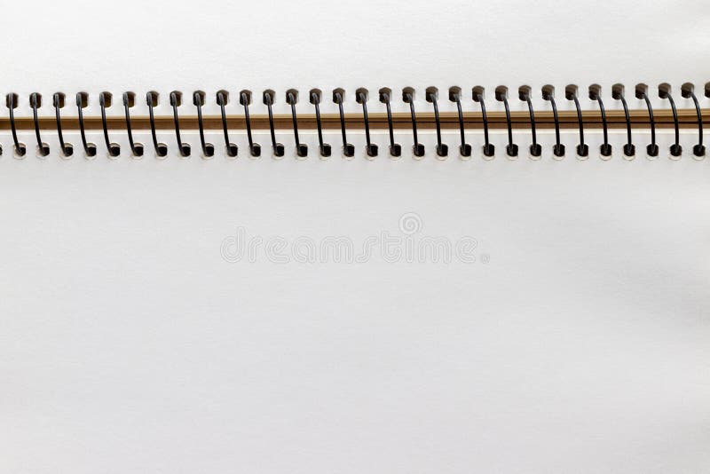 Open Spiral Notebook with Blank Empty White Sheets on a Bright Yellow ...