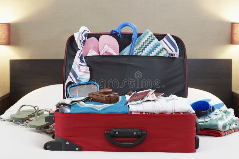 Open Suitcase Full of Clothing Stock Photo - Image of glasses ...