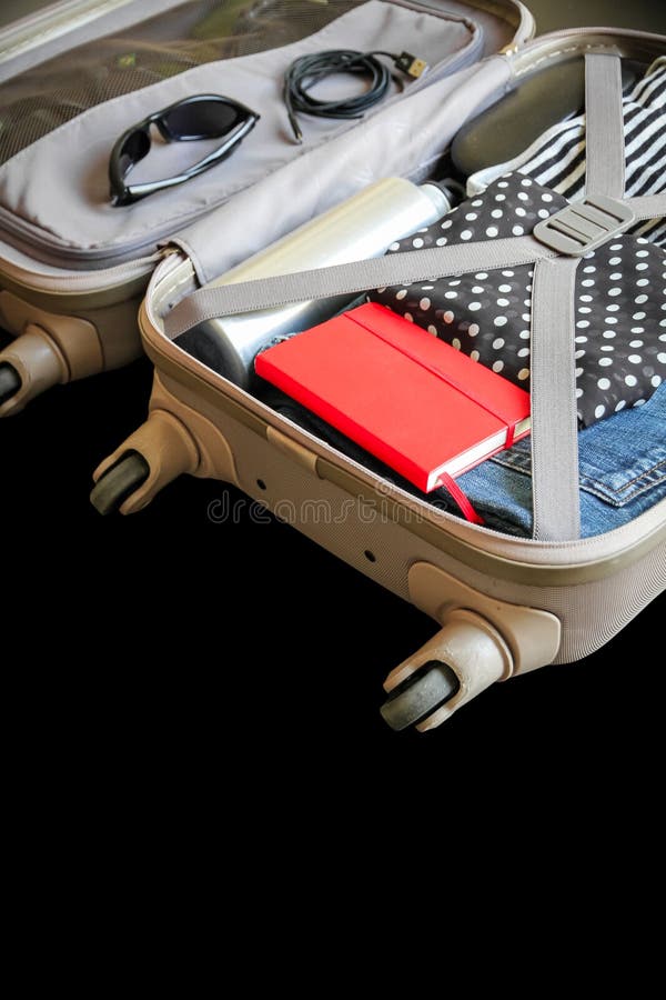 Open Suitcase Full of Clothes Isolated on Black Background Stock Image ...