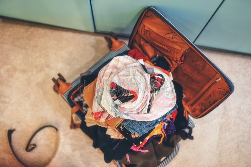 Open Suitcase Full of Clothes in Room. Stock Image - Image of indoors ...