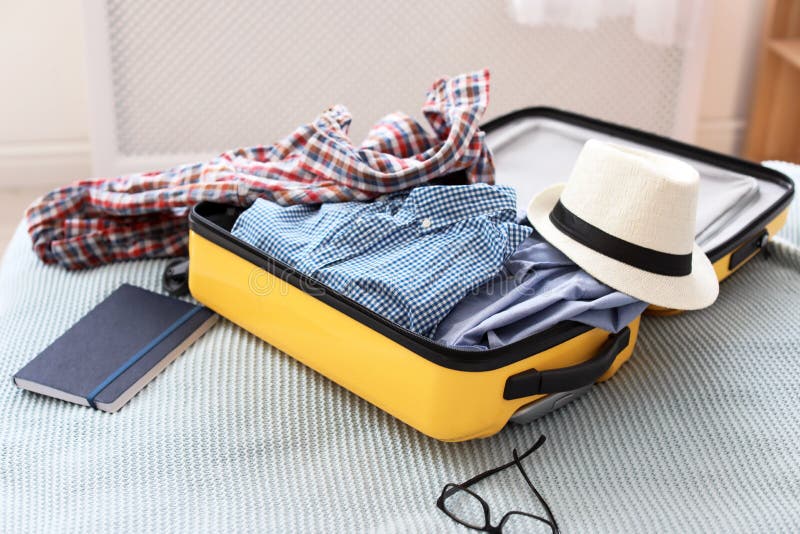 Open Suitcase with Packed Clothes Stock Photo - Image of belongings ...