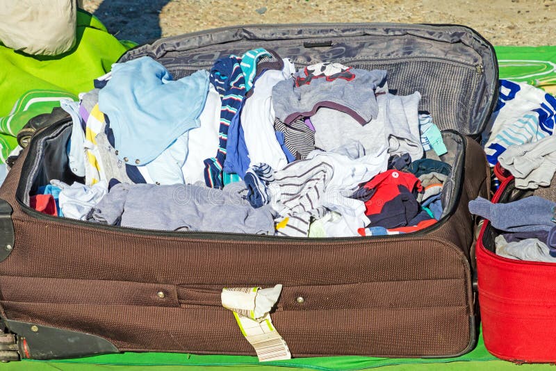 Open Suitcase with Packed Clothes Stock Photo - Image of packed ...